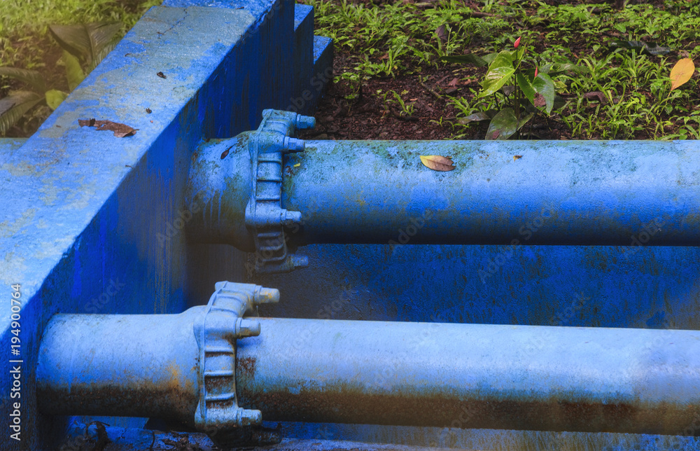 Water pipes of sewage treatment plant in tropical rainforest in Costa ...