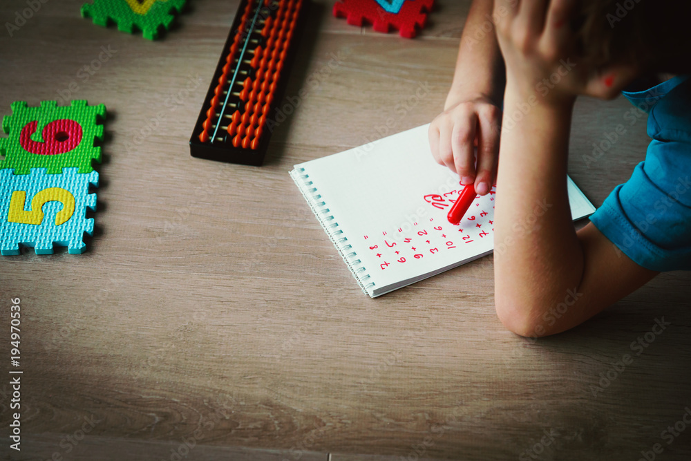 little boy learning math, numbers, calculations Stock Photo | Adobe Stock