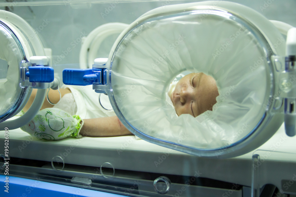 Cute baby newborn in a germ disinfection in a modern hospital. Stock ...