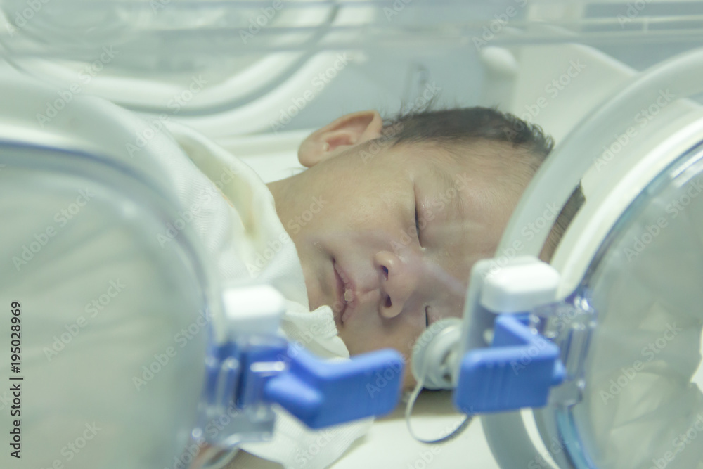 Cute baby newborn in a germ disinfection in a modern hospital. Stock ...