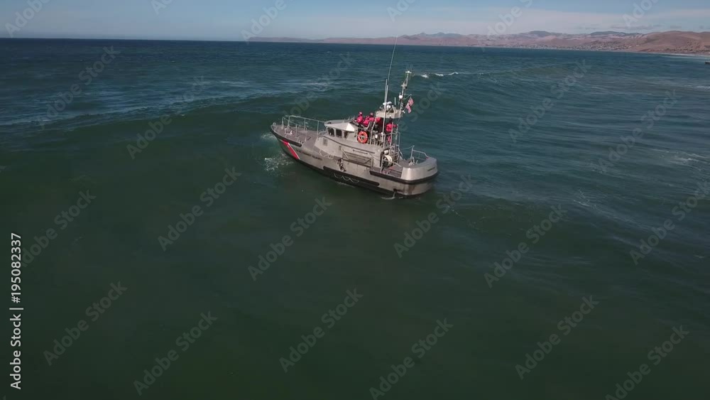 hover boat over waves coast guard, rough seas, rouge wave crashing over ...