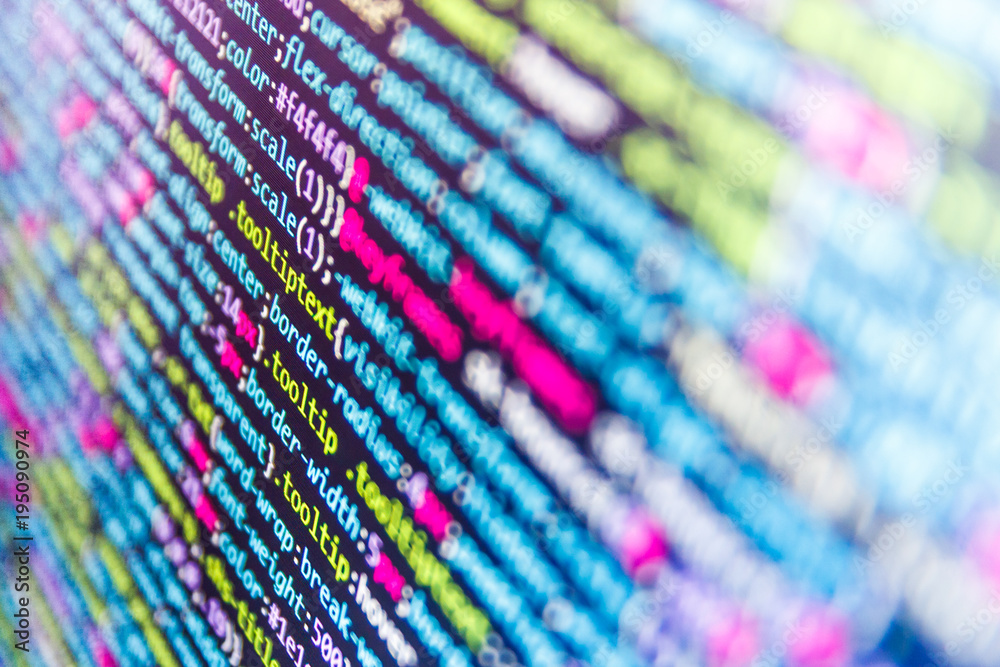 Data network hardware Concept. IT specialist workplace. Coding script text on screen ...