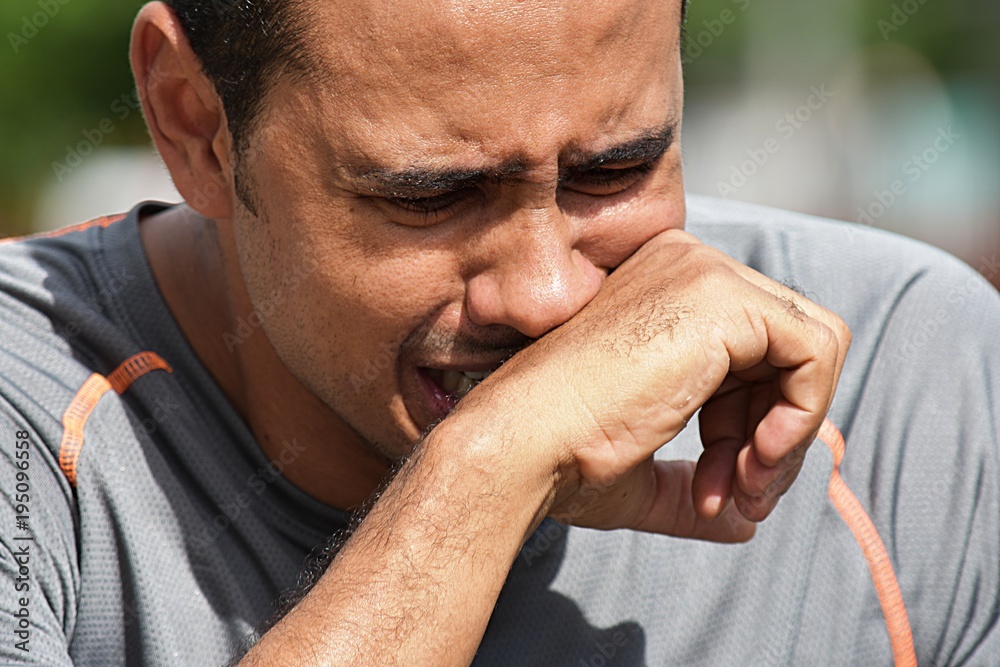 Crying Male Athlete Stock Photo | Adobe Stock