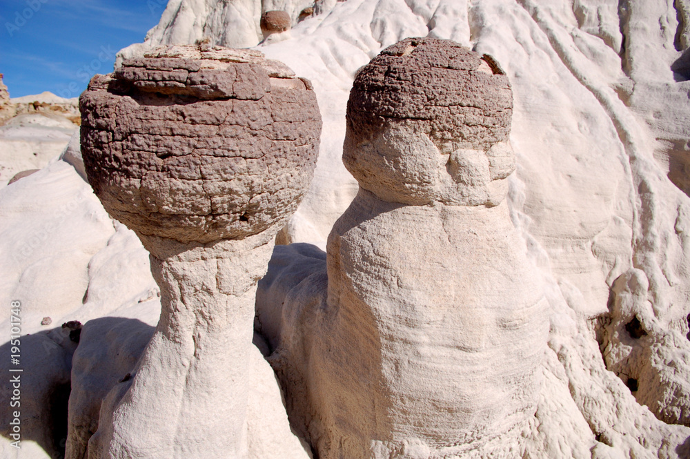 Round, pitted, natural sandstone rocks in the desert badlands of Bisti ...