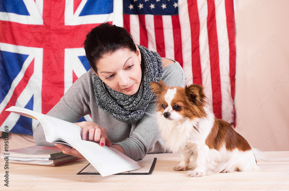Simple learning language concept. English even for dog. Young woman and ...