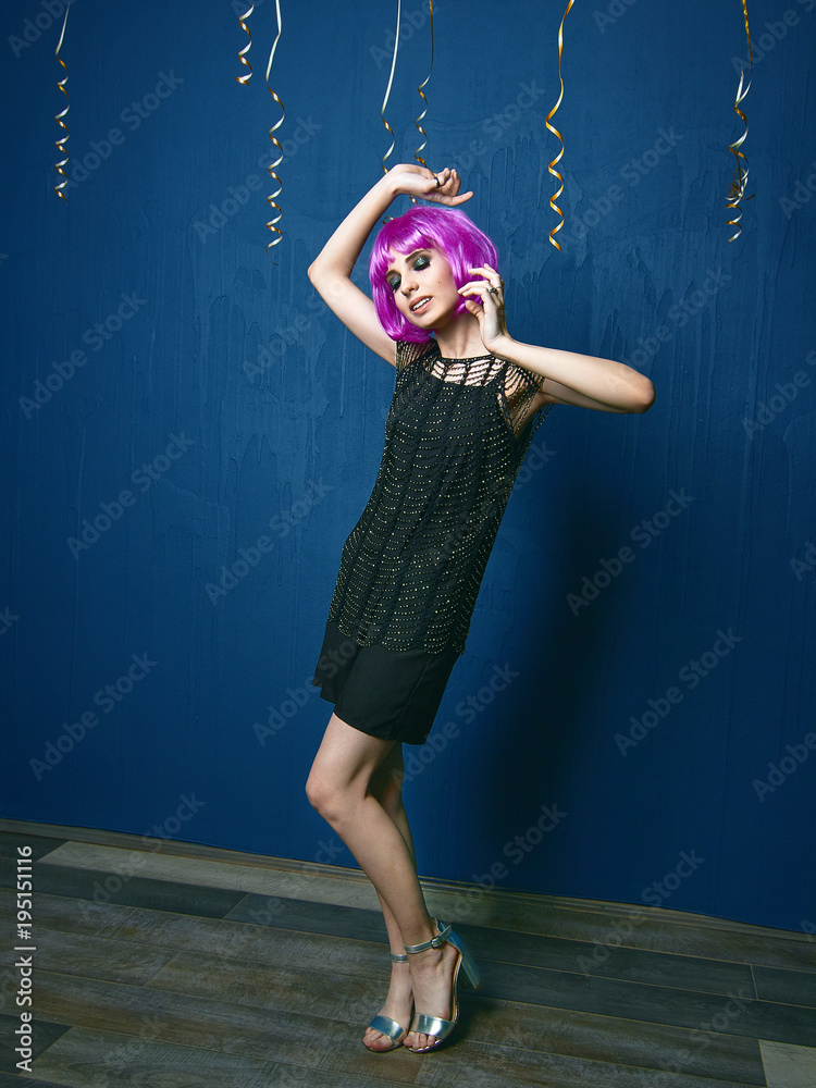 Celebration Girl at the party Girl with pink hair in black dress is ...