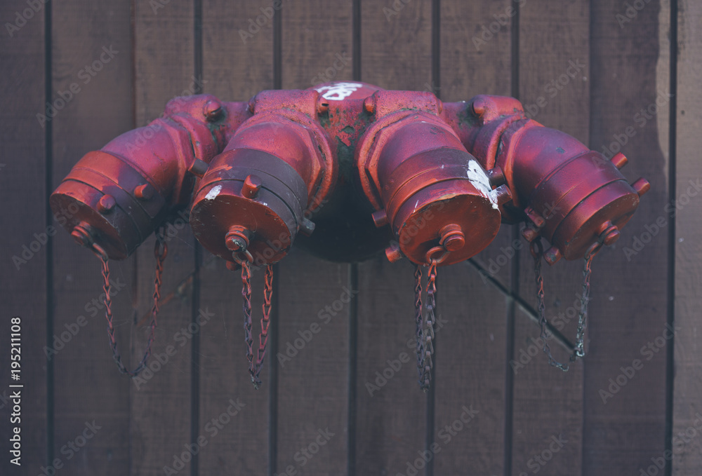 Foto de Detail of fire hydrant access piping on side of building do ...