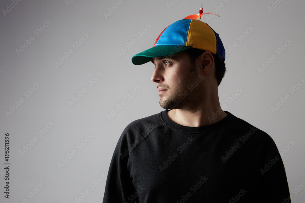 Man Leaning Against Wall Hat