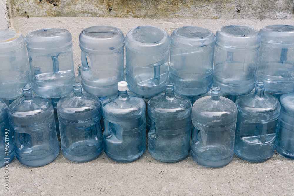 Pile of recycled plastic water bottle containers Stock Photo | Adobe Stock