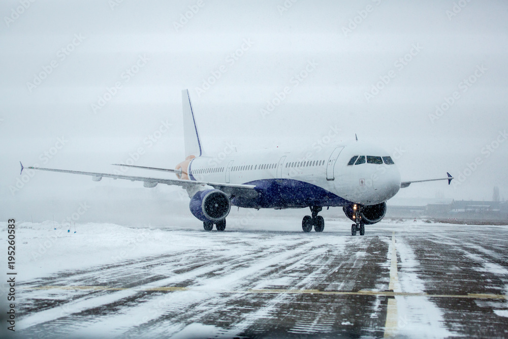Snow On The Runway With Airplane