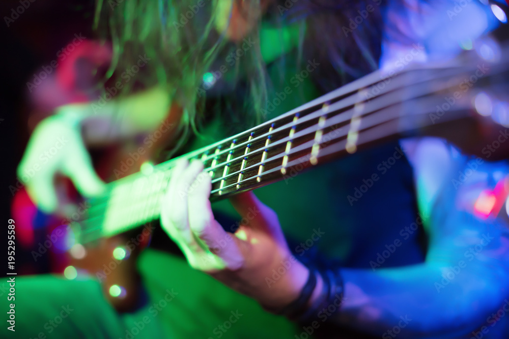 Stage lights.Abstract musical background.Playing guitar and concert ...