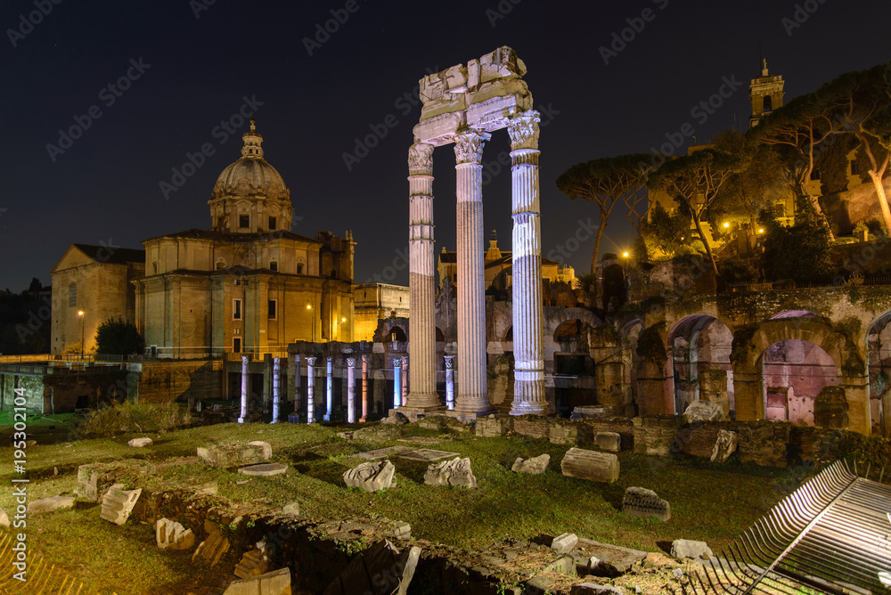 Monuments of ancient Rome at night. Colosseum, Arch of Constantine and ...