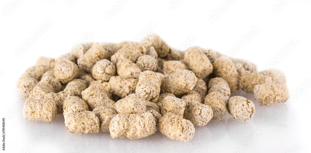 extruded wheat bran pellets isolated on white. Stock Photo | Adobe Stock