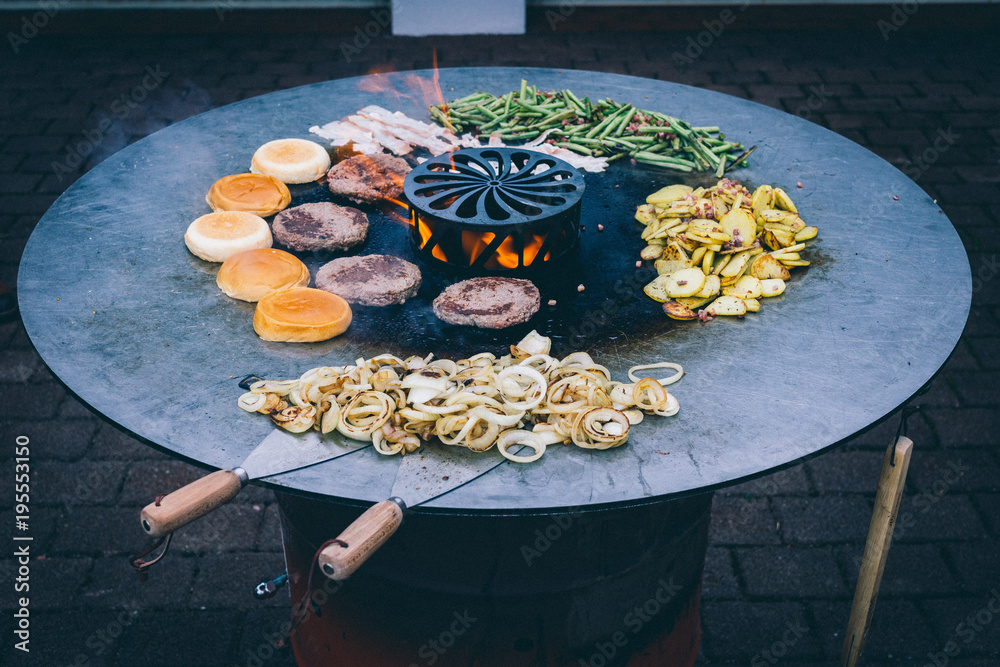 Feuerplatte grilled smoked BBQ Burger & Steak Fireplate Plancha Stock ...