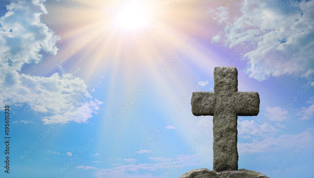 Symoblic Cross of Jesus Christ and God's Light - Rugged stone cross in ...