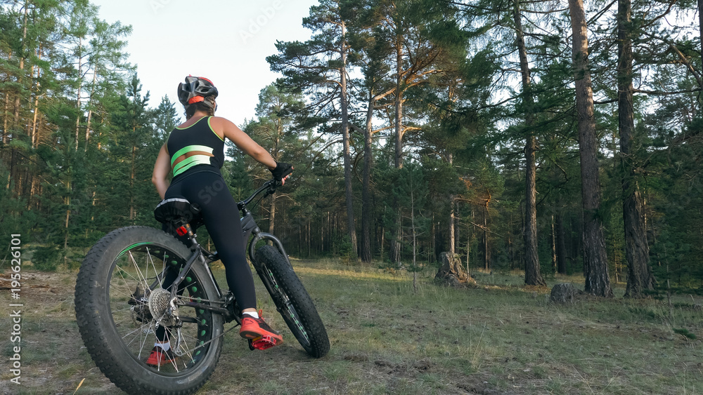 Fat bike also called fatbike or fat-tire bike in summer riding in the ...