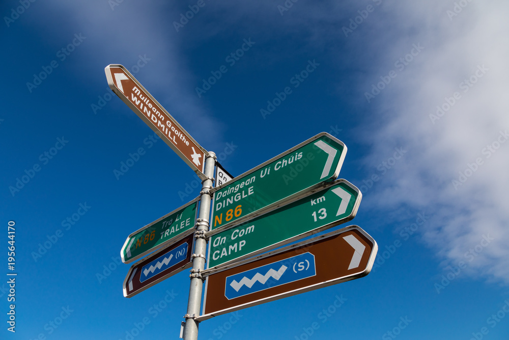 directional arrow road signs towards towns and tourist sites in County ...