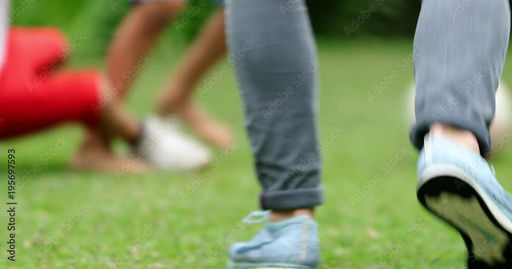 Children running after soccer ball. Kids playing football in 4K Stock ...