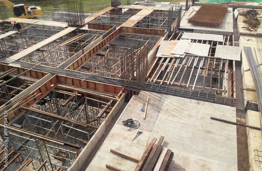 Construction workers fabricated timber form work at the construction ...