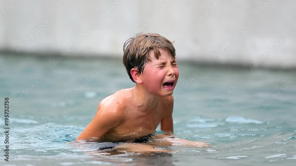 Child crying in real pain. Child in agony after having been physically ...