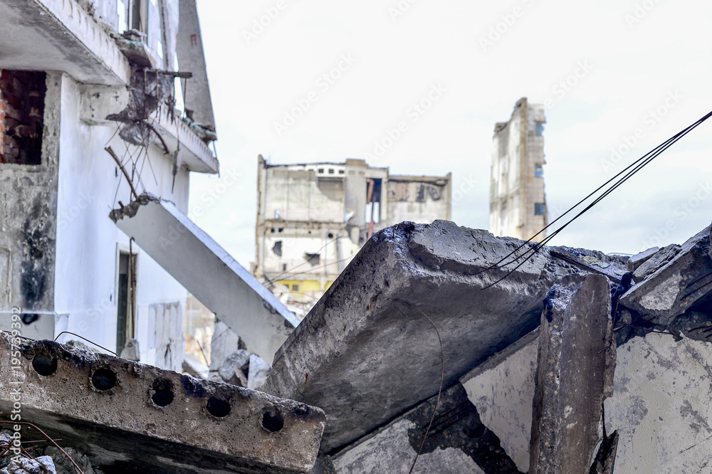 Remains of the destroyed industrial building. The skeleton of a large ...