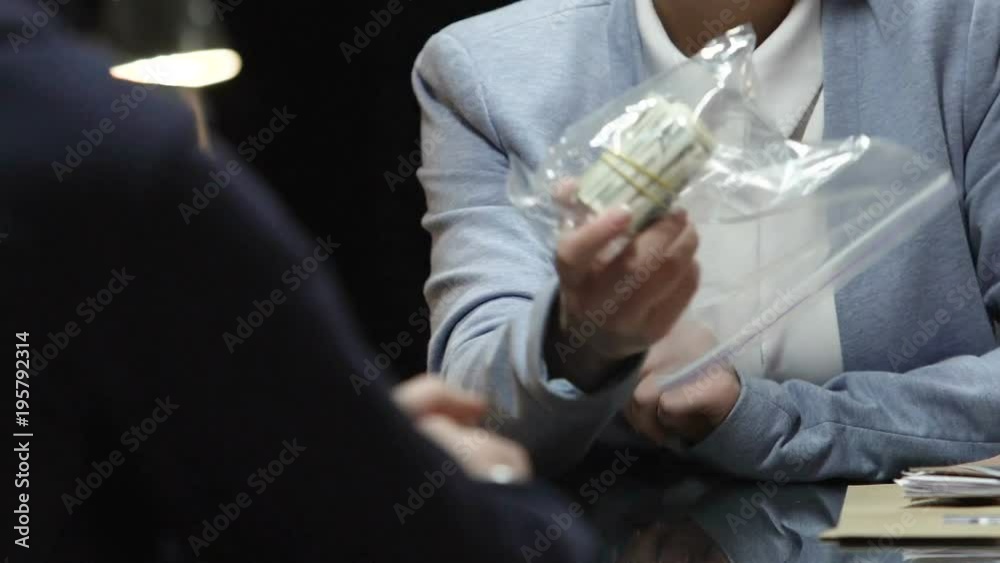 Corrupt official caught on taking bribe talking with investigator under ...