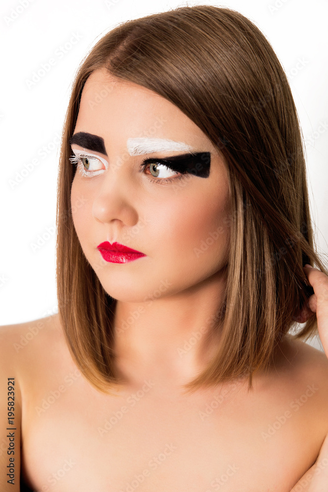 girl model with a short haircut and black and white eyebrows. Stock ...