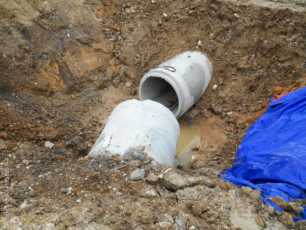 Precast concrete round culvert drain under construction at the ...