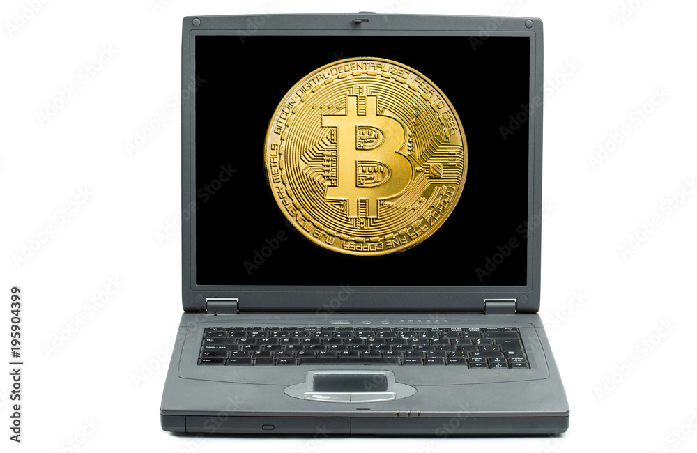 Bitcoin on display of old laptop. Cryptocurrency and digitally concept ...