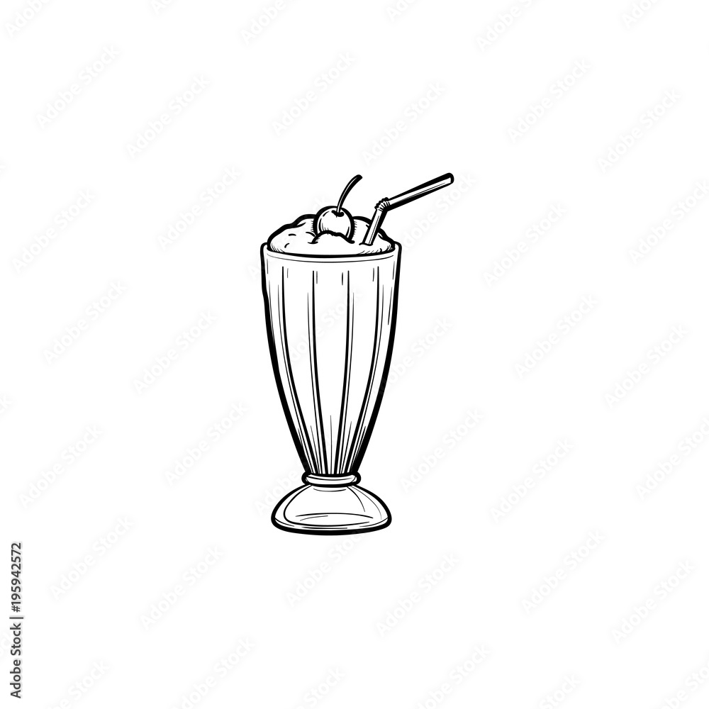 Milk cocktail with a maraschino cherry and straw in tall glass hand ...