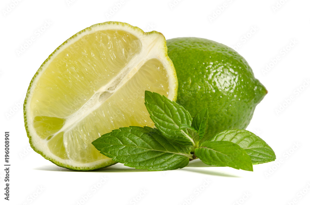 one lime with half of a juicy lime with leaves of mint isolated on ...