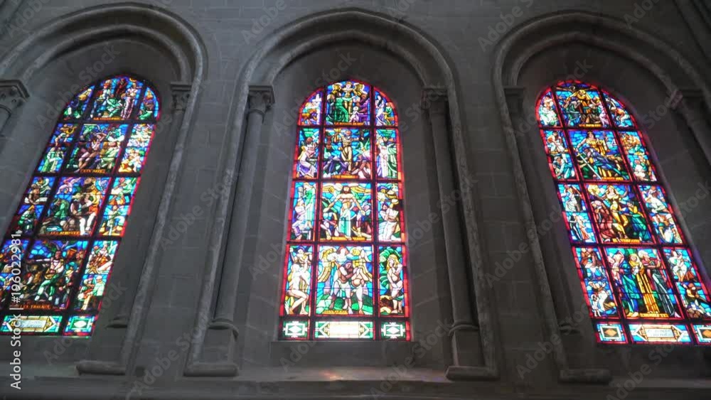 Beautiful roman stained glasses in a Church - cinematic dolly shot ...