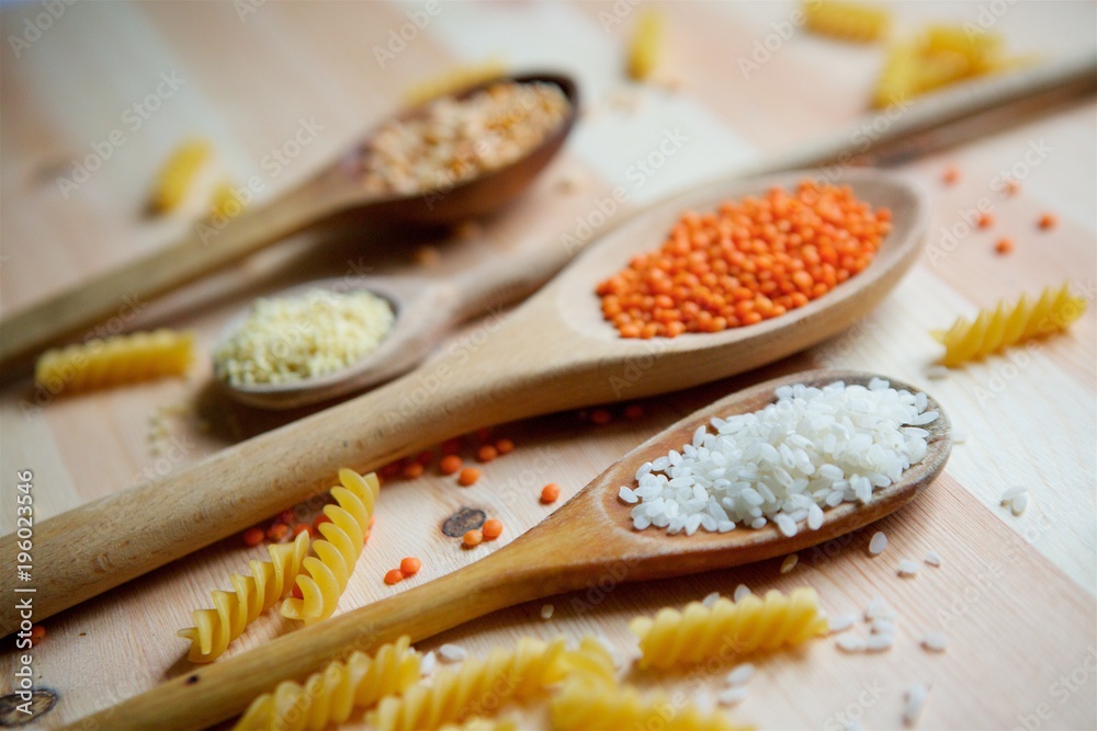 On the surface of wood are the wooden spoons of different kinds, which ...