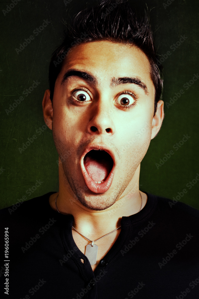 Surprise face expression of scared young man Stock Photo | Adobe Stock