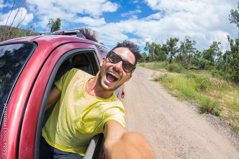 Handsome man take a selfie in a car at roadtrip Stock Photo | Adobe Stock