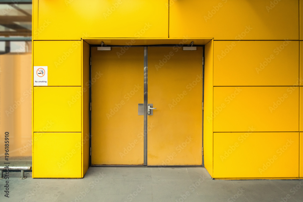 Emergency fire exit door and aluminum composite wall of warehouse Stock ...