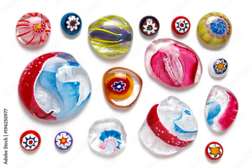 Collection of colorful glass beads of different sizes and shapes ...