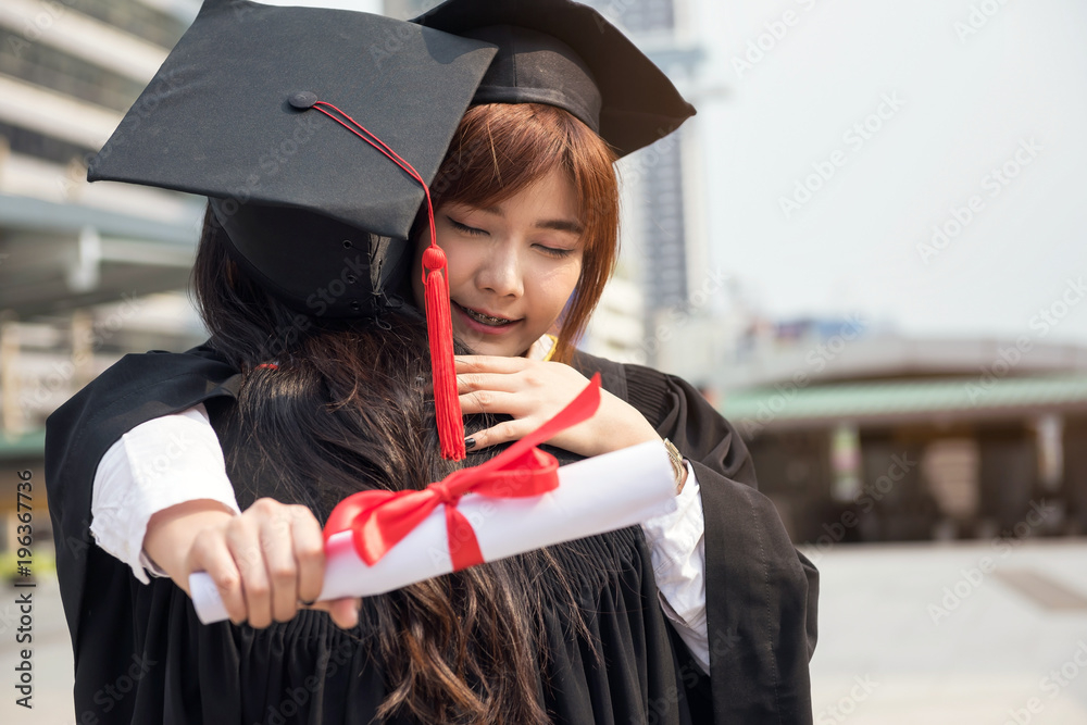 women with graduation suit, Commencement day Stock Photo | Adobe Stock