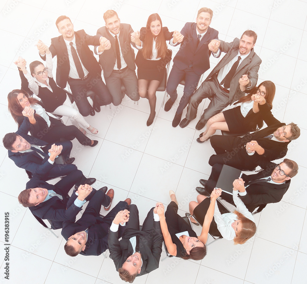 concept of team building .large successful business team sitting in a ...