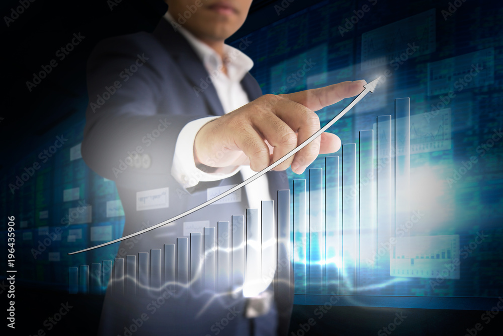 Investor drawing growth chart. Stock Photo | Adobe Stock