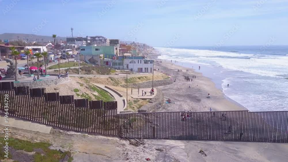 A dramatic aerial reveals the U.S. Mexico border fence in the Pacific ...