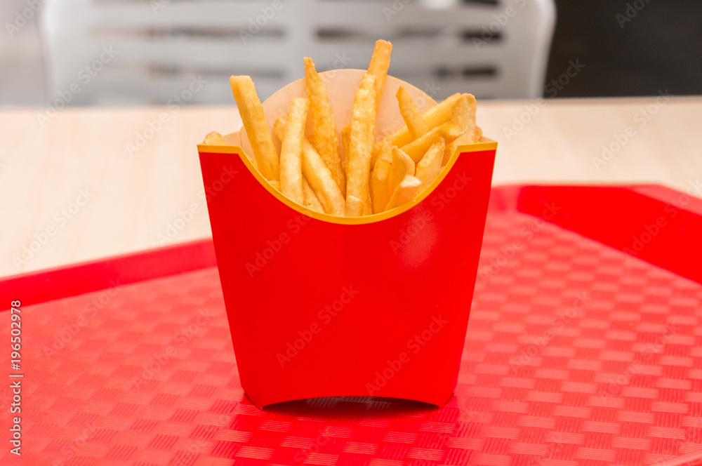 French fries in red box on a tray Stock Photo | Adobe Stock