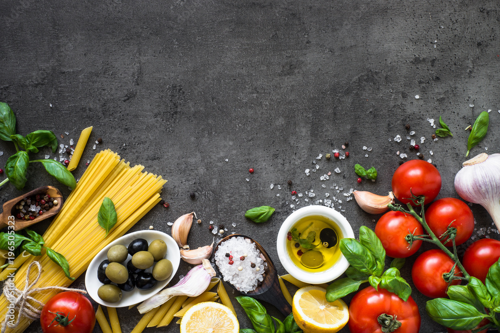 Italian Food background on black stone table. Top view. Stock Photo ...