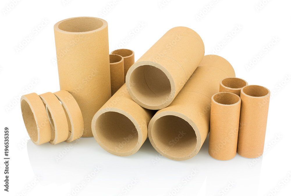 A bunch of brown industrial paper core isolated on white background ...