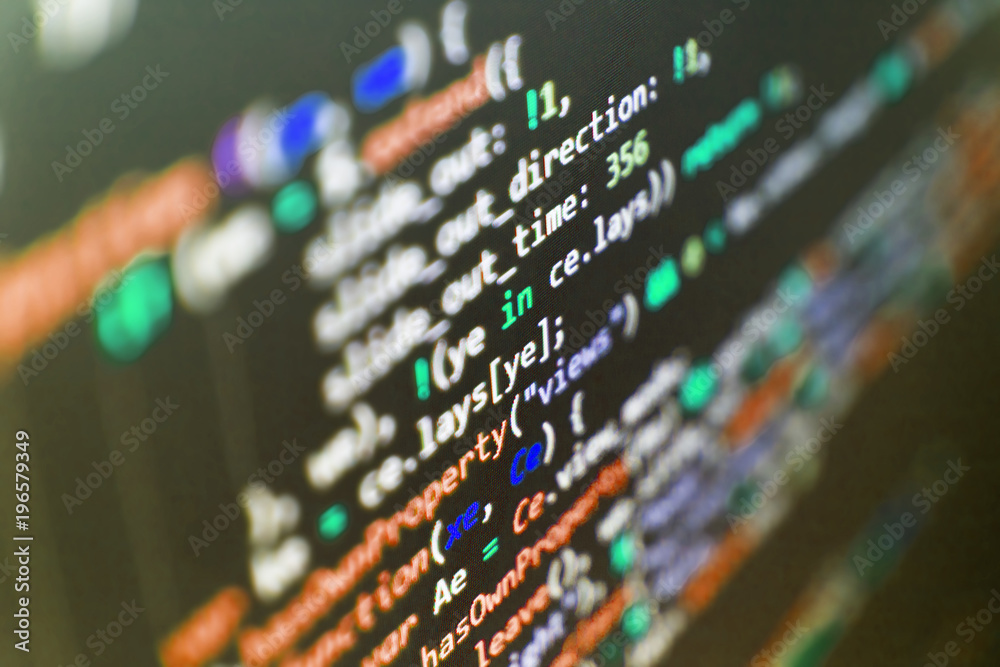 Website design. Programming code on computer screen. New technology ...