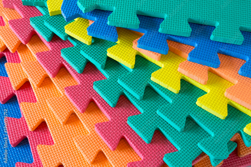 jigsaw soft mat background and texture, variety color puzzle mat. Stock ...