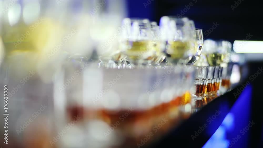 close-up view of different alcohol drinks in goblets and wine glasses ...