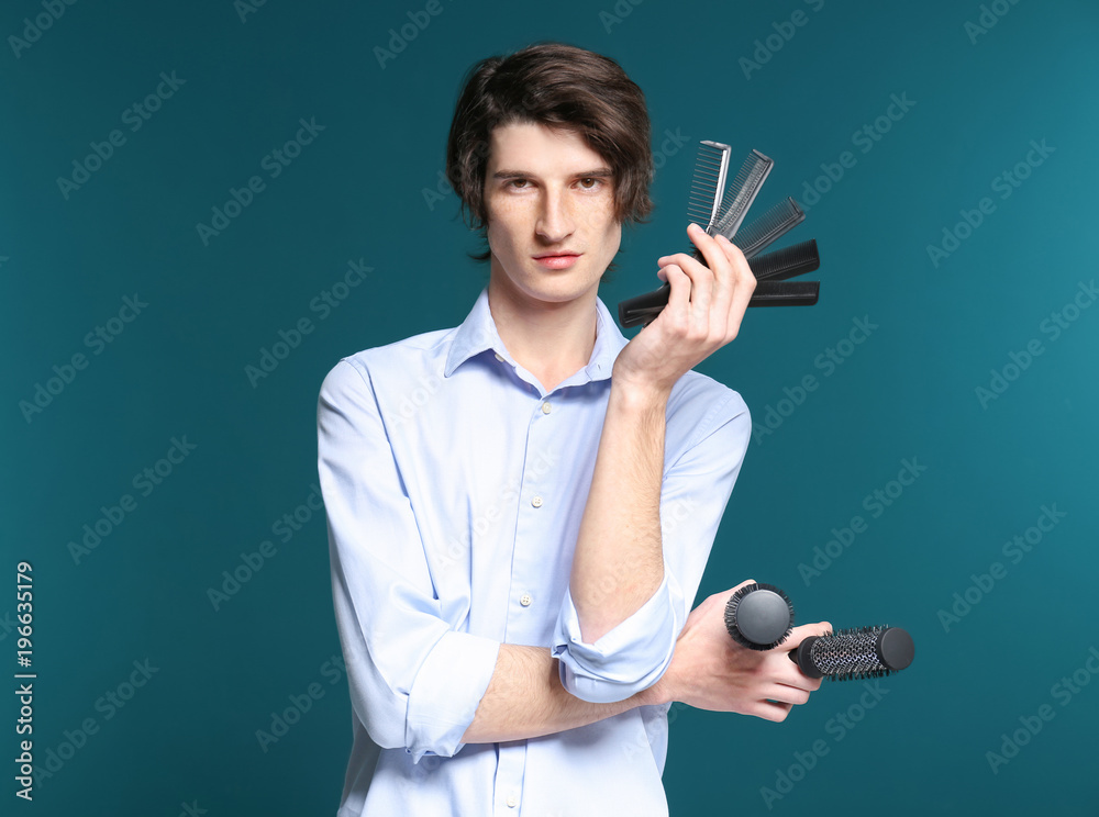 Professional hairdresser on color background Stock Photo | Adobe Stock