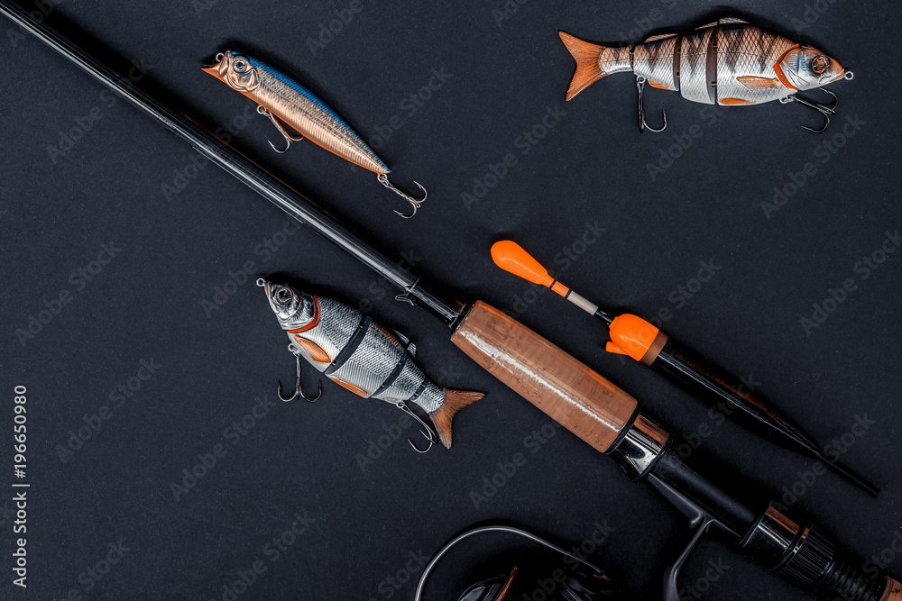 Fishing tackle still life on a wooden background. Stock Photo | Adobe Stock