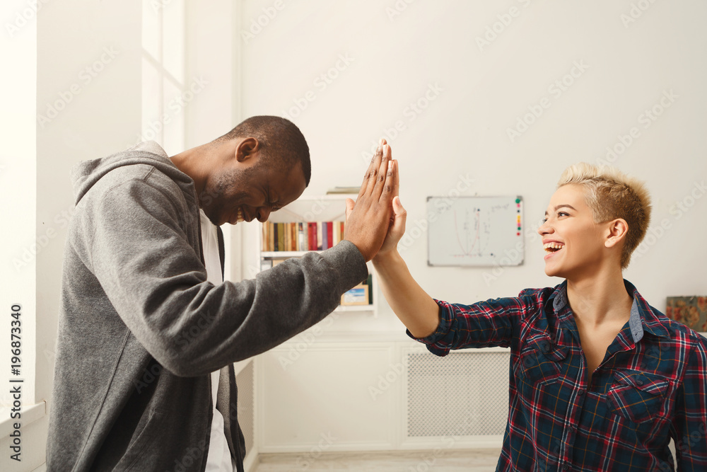 Multiethnic male and female hands putting hands together Stock Photo ...